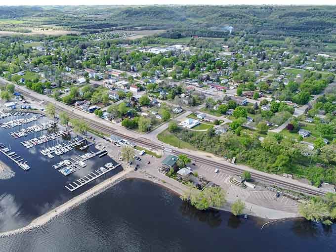From above, this riverside gem reveals its secret: a marina full of boats and tree-lined streets waiting to be explored.