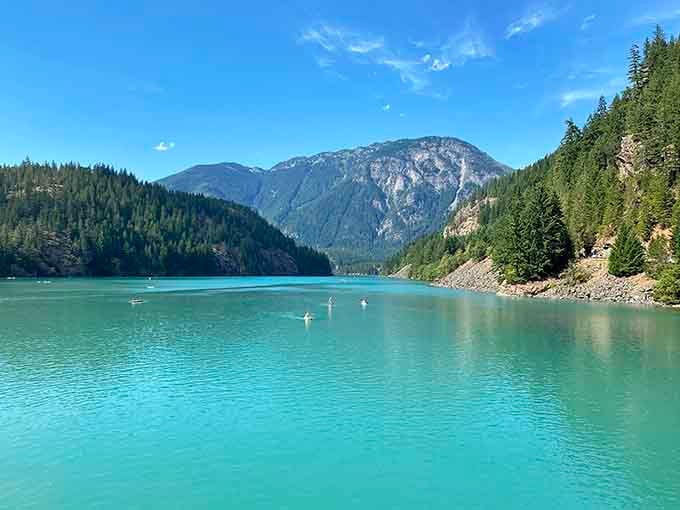 That turquoise water looks like someone dumped a thousand bottles of blue Gatorade into a mountain paradise.