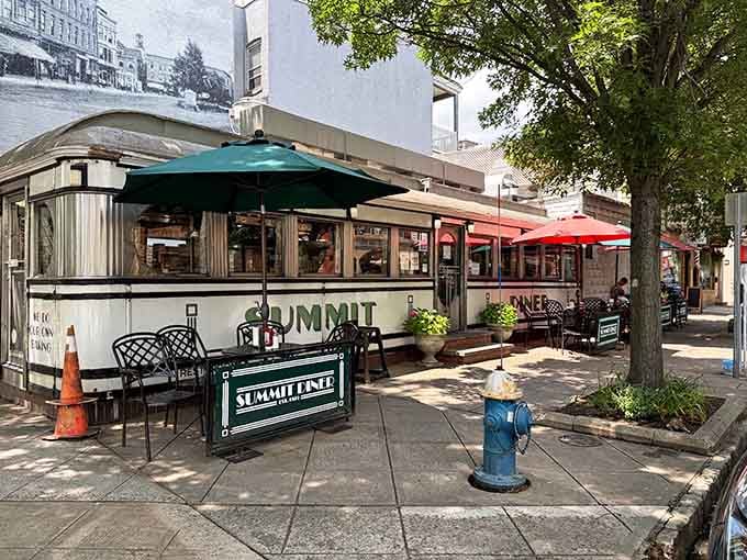 Outdoor seating under cheerful umbrellas makes this classic silver diner feel like a European sidewalk caf&eacute; with pancakes.