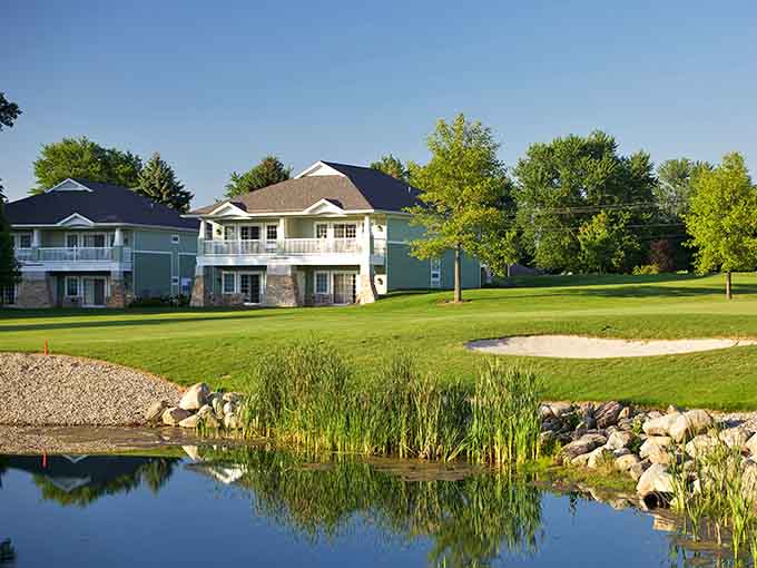 Fairway views and glassy water reflections make Swan Lake Resort look like a postcard that never got mailed.