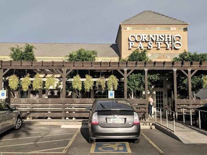 That distinctive peaked roof isn't just architectural flair, it's your beacon to British comfort food in the desert.