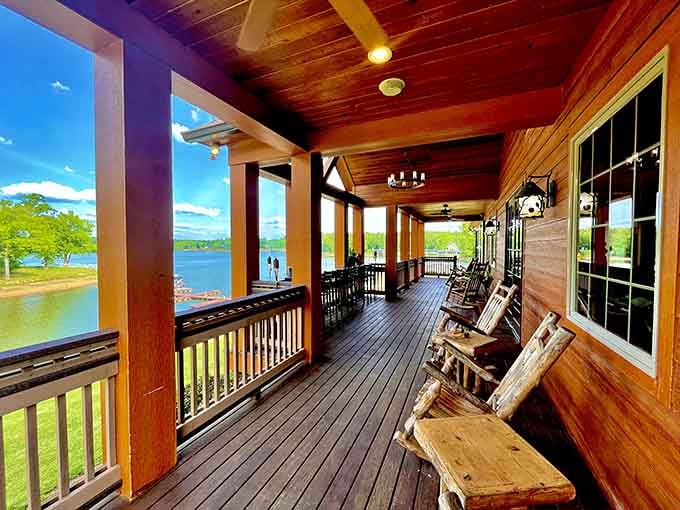 Rustic rocking chairs, warm wood, and Lake Wateree sparkling beyond the porch. This is where stress comes to retire.