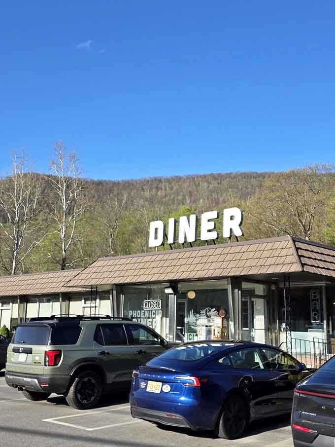 That iconic rooftop sign against the Catskills backdrop is your beacon to breakfast bliss and beyond.