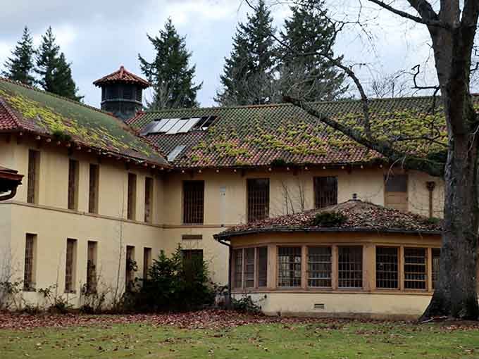 Moss-covered rooftops and barred windows tell a story that no tour guide could ever fully explain.