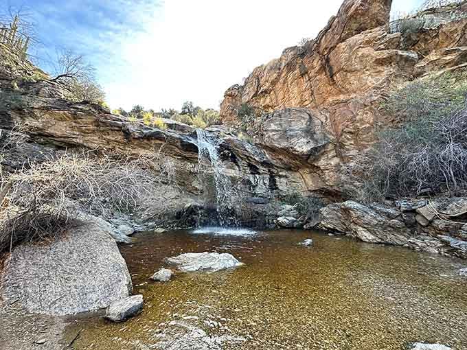 Water cascading over layered rock in the desert? Arizona just broke all the rules and we're here for it.