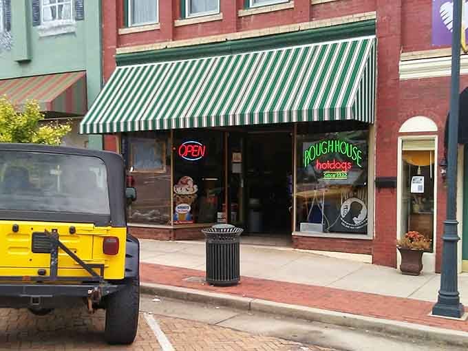 That green and white striped awning has been welcoming hungry souls since hot dogs cost a nickel.