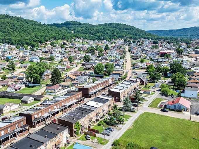 Brick rowhouses and green hills frame Toronto's skyline, proof that affordable Ohio living looks absolutely gorgeous from above.