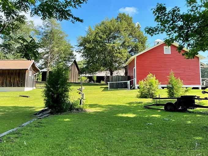 Lush green lawns and historic buildings create a village frozen in time, minus the dial-up internet.