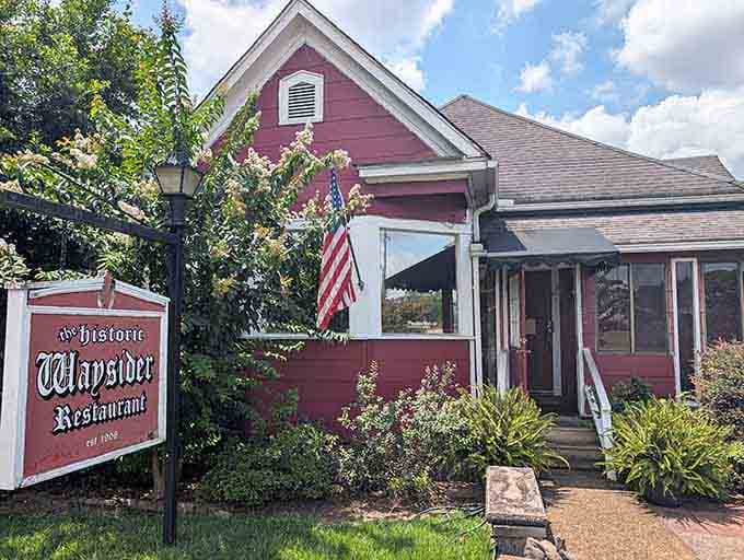 That red cottage and gothic signage say one thing clearly: serious Southern breakfast lives here.