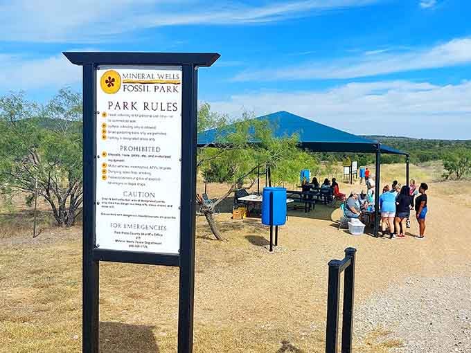 The park rules sign sets the tone: come curious, leave with ancient treasures, and behave yourself.
