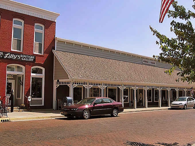 Brick streets and vintage storefronts create a scene straight from a Norman Rockwell painting come to life.