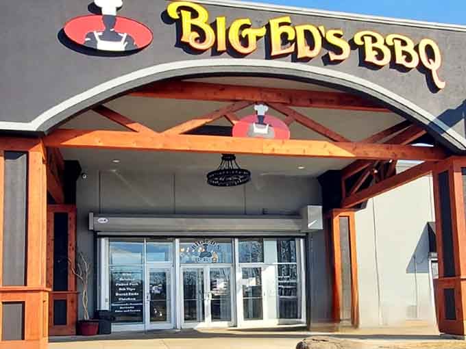 Big Ed's golden signage gleams like a beacon, guiding hungry travelers toward their next great barbecue adventure.