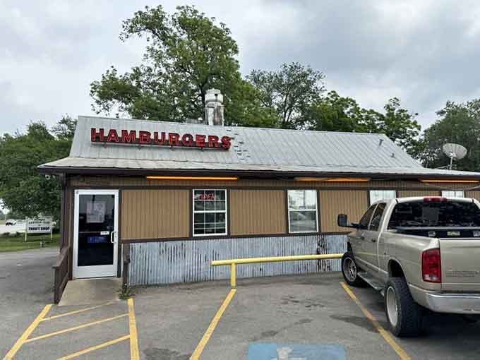 Even under cloudy skies, this little brown roadside building radiates the kind of welcoming energy that says, "Trust us."