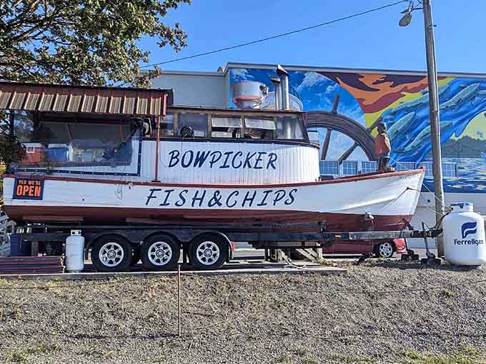 That vibrant mural backdrop makes this landlocked gillnetter look like it's still telling sea stories.