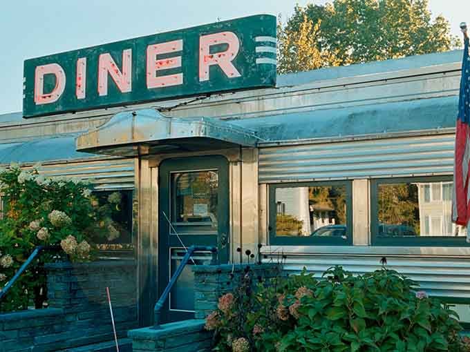 Golden hour hits the corrugated steel just right, making this Hudson Valley classic look like a Norman Rockwell painting.