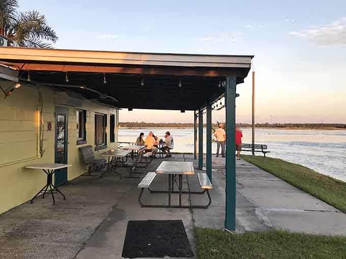 Golden hour hits differently when you're watching the St. Johns River glow from a simple picnic table with good food nearby.