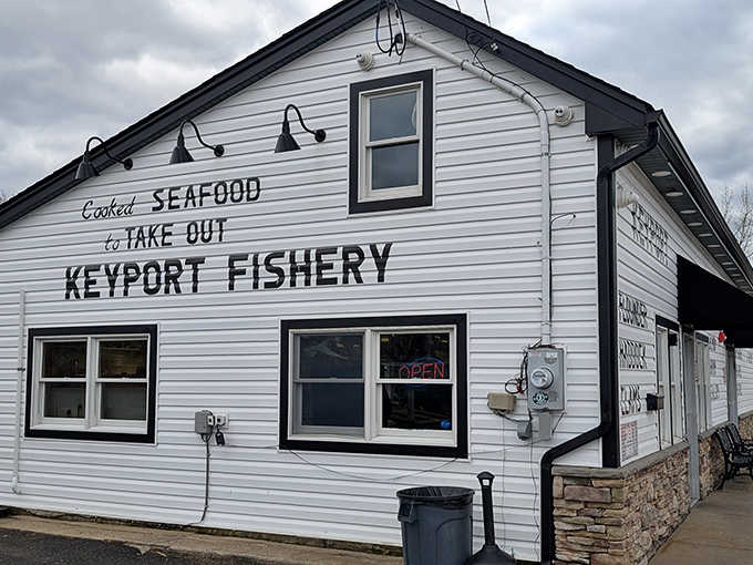 That glowing "Open" sign in the window is basically a lighthouse guiding hungry locals straight to fresh seafood.