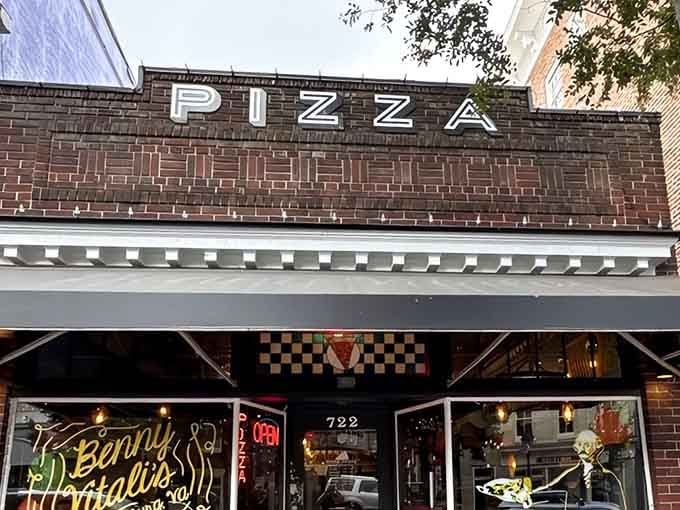 That glowing "PIZZA" sign isn't just advertising, it's a beacon of hope for the hungry.