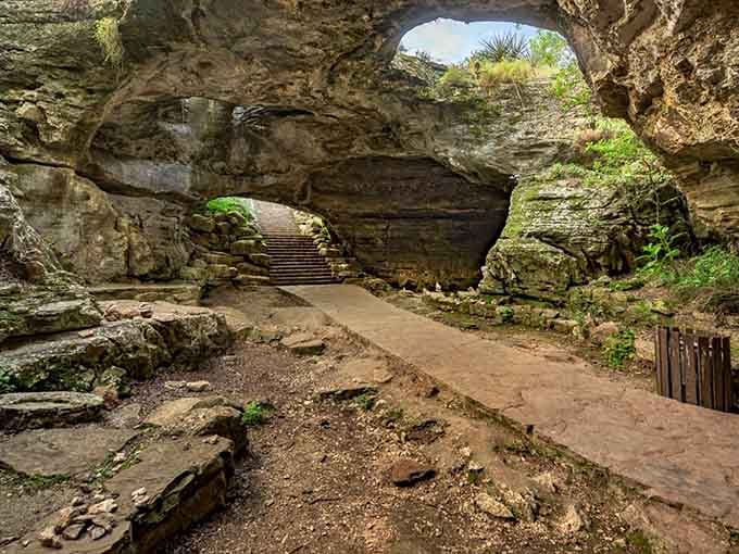 That massive natural archway frames the sky like nature's own front door, wide open and waiting.