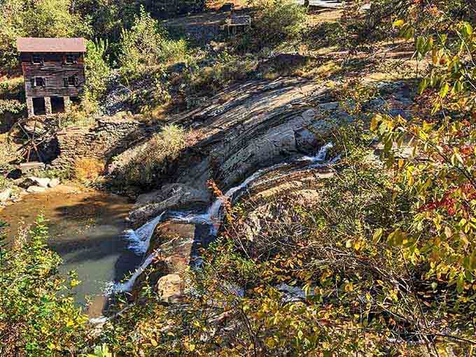 The layered falls tumble over ancient rocks while autumn colors frame this peaceful hidden treasure perfectly.