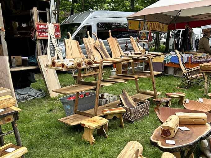 Handcrafted wooden furniture sits on the grass, proof that some treasures are built to last generations.