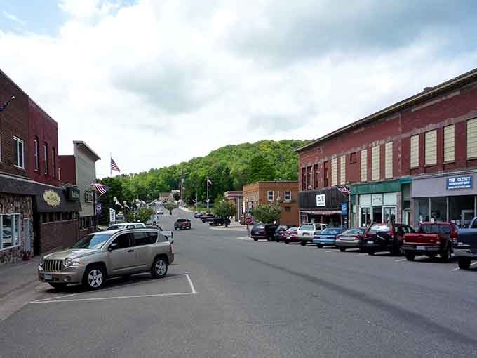 Main Street stretches toward green hillsides, inviting you to explore shops where locals still know your name.