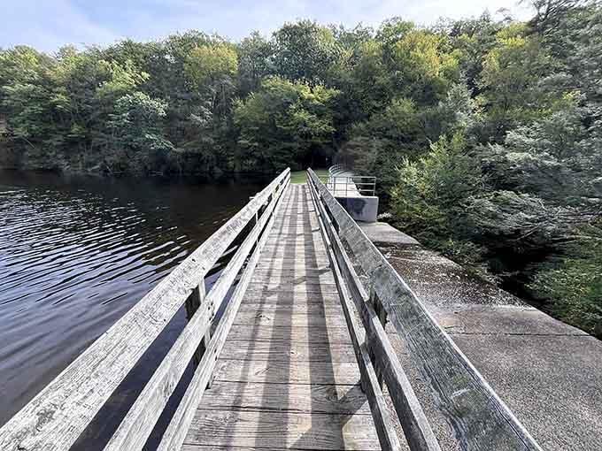 That long wooden bridge over Green Fall Pond is basically Connecticut's version of a red carpet, minus the paparazzi.
