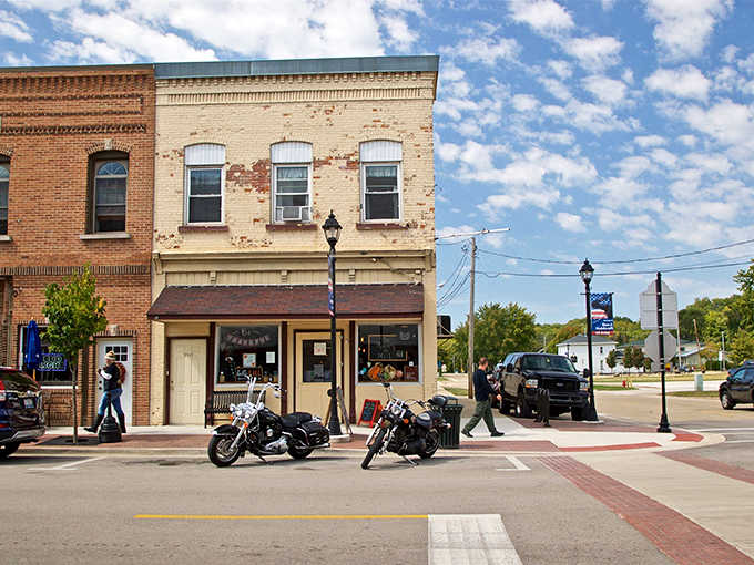 Those motorcycles parked outside historic storefronts tell you this town welcomes everyone who appreciates authentic small-town character.