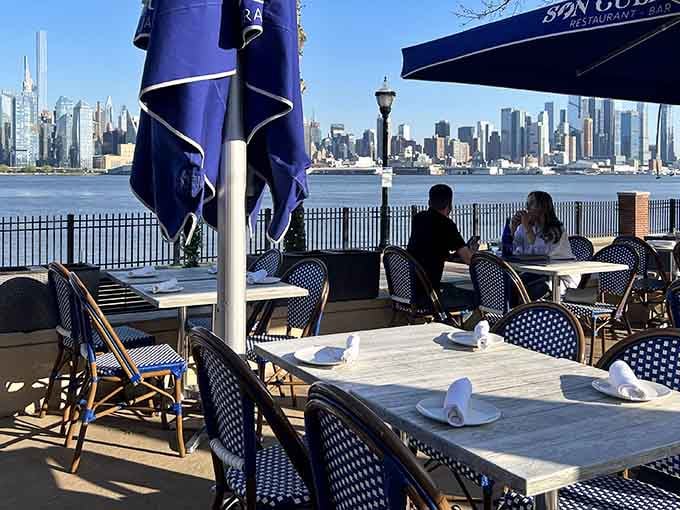 Two people, one skyline, zero complaints. Son Cubano's patio is basically a postcard you can eat at.