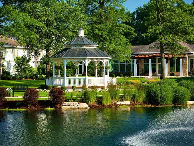 That white gazebo beside the fountain pond is basically Swan Lake Resort saying, "Yes, we really are this lovely."