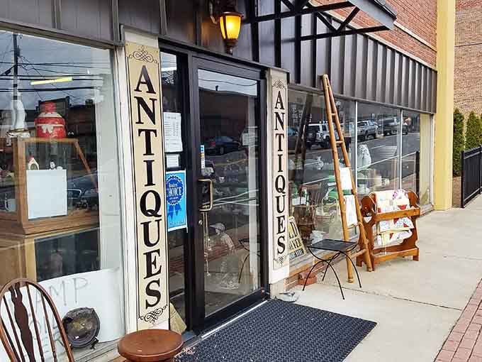 Two "ANTIQUES" signs flanking one door means double the invitation, and double the trouble for your wallet.