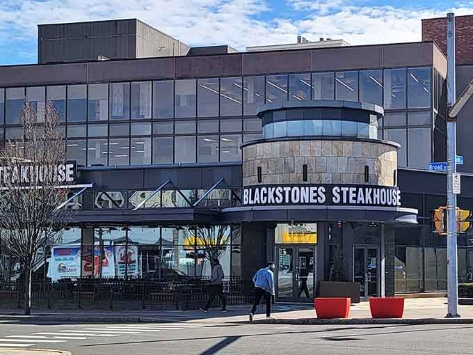 The bold signage against Stamford's skyline promises serious steaks and delivers on every letter.