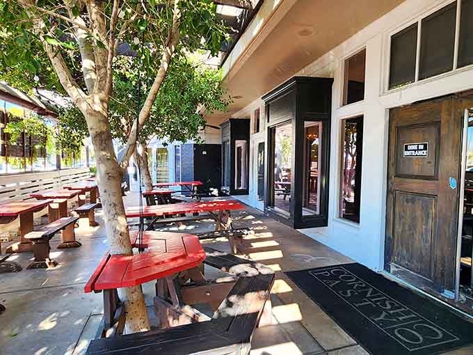 The outdoor patio proves that British pub culture translates beautifully to Arizona's sunshine and shade-dappled afternoons.
