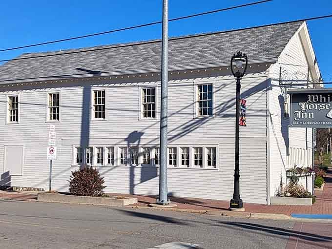 Crisp afternoon light reveals every proud angle of this classic white clapboard building in charming Metamora.