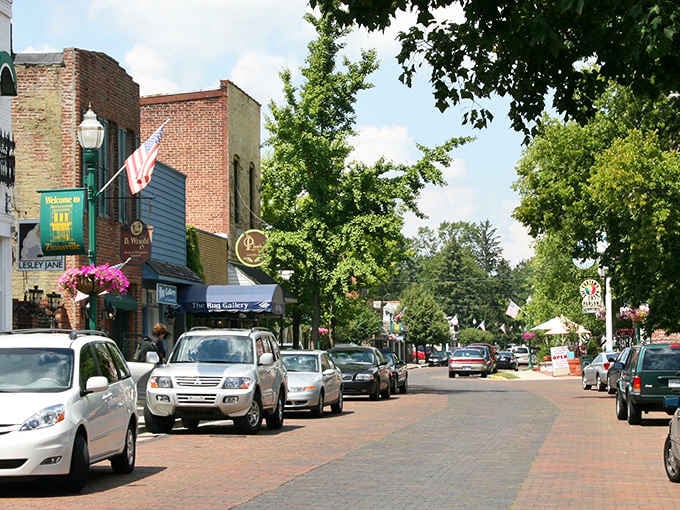 Tree-lined streets invite leisurely strolls where the only rush is deciding which charming shop to visit first.