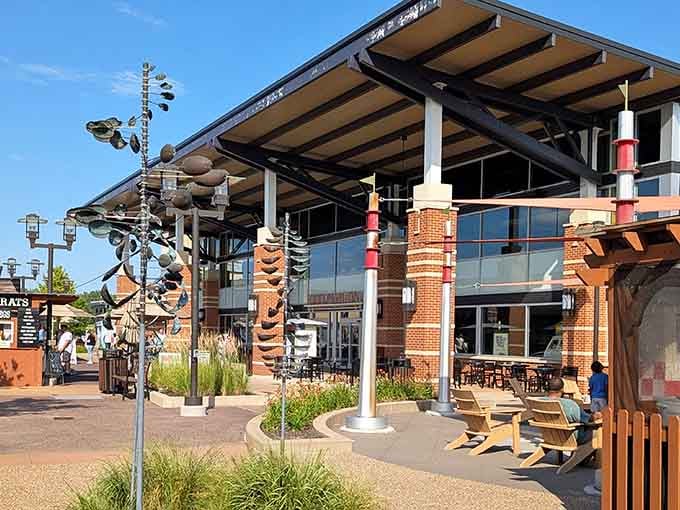 Modern architecture meets practical design with shaded seating areas perfect for regrouping between store visits.