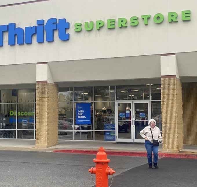 One shopper outside, a fire hydrant standing guard, and a store full of deals waiting just beyond those glass doors.