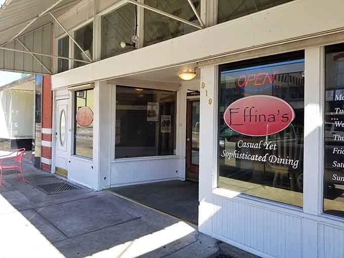 That neon "OPEN" sign at Effina's is basically Alabama's most welcoming invitation to eat something wonderful.
