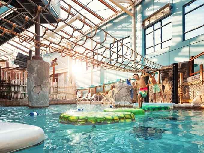 Floating platforms over water: proof that adults secretly never stopped wanting a playground.