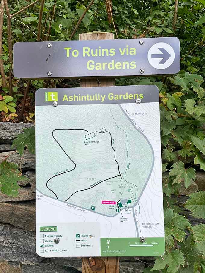 The sign says "To Ruins via Gardens," which is honestly the most exciting set of directions since "turn left at the castle."