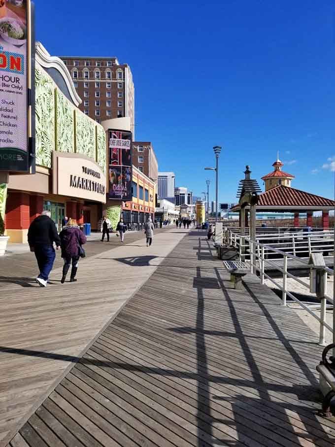 Enjoy a sunny stroll down the historic wooden planks, passing towering hotels, lively storefronts, and charming oceanfront pavilions.