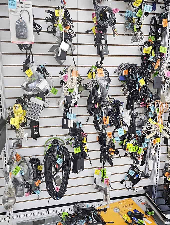 Every cable here has a story, and a colorful price tag. Your missing charger might just be hanging right there.