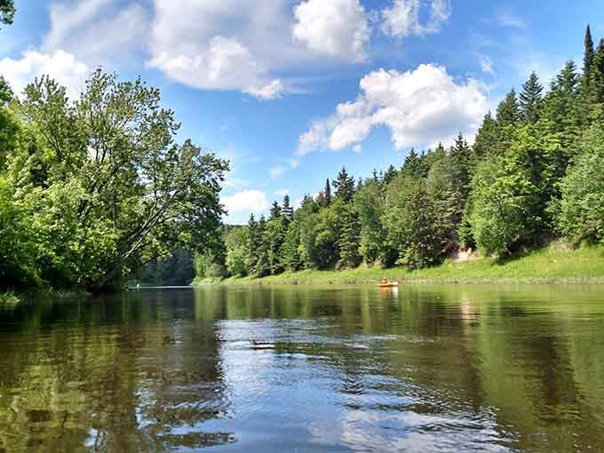 A lone kayaker on the Bigfork River, looking like the luckiest person in all of northern Minnesota.