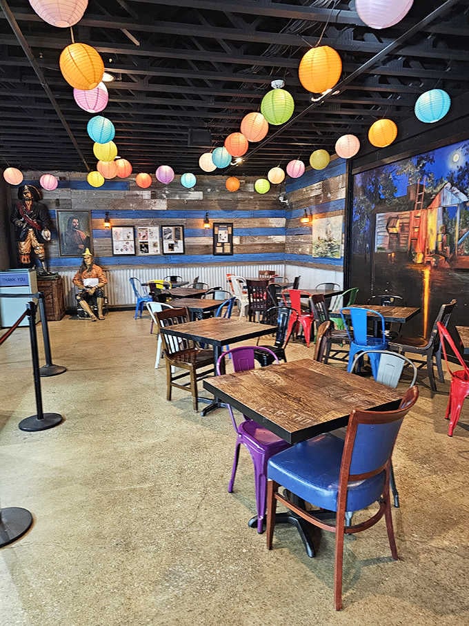 Those cheerful lanterns overhead create a party atmosphere that makes every meal feel like a celebration worth attending.