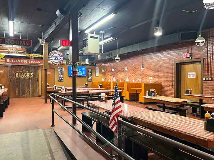 Red-and-white checkered tables, brick walls, and vintage signs everywhere, this dining room means serious, no-nonsense business.