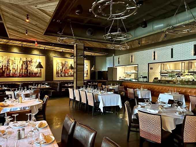 White tablecloths and open kitchen design create an atmosphere that's elegant without being intimidating.