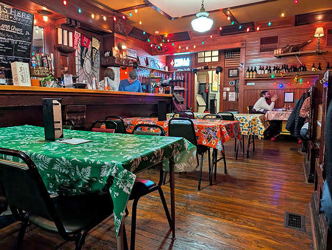 Mismatched tablecloths, string lights, and a bar that's seen some stories. Your new favorite dining room awaits.