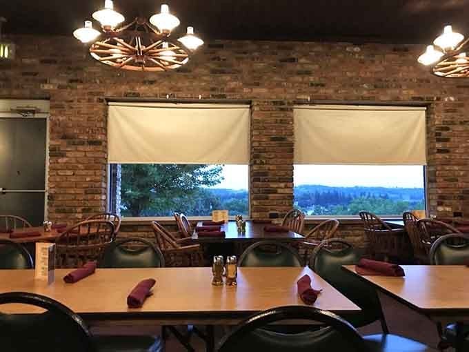 Wagon wheel chandeliers, brick walls, and a view that'll make you forget what you were worried about. Pull up a chair.