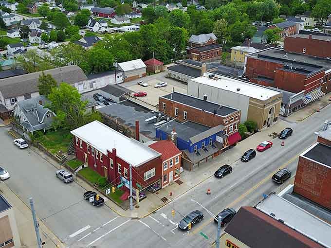 From above, this downtown reveals its colorful rooftops and tree-lined streets like a perfectly preserved secret waiting to be discovered.