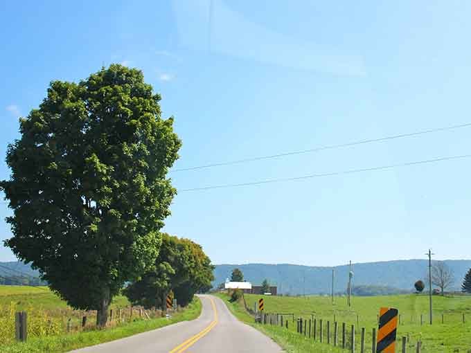 That open road feeling hits different when you're driving through the inside of a collapsed ancient mountain.